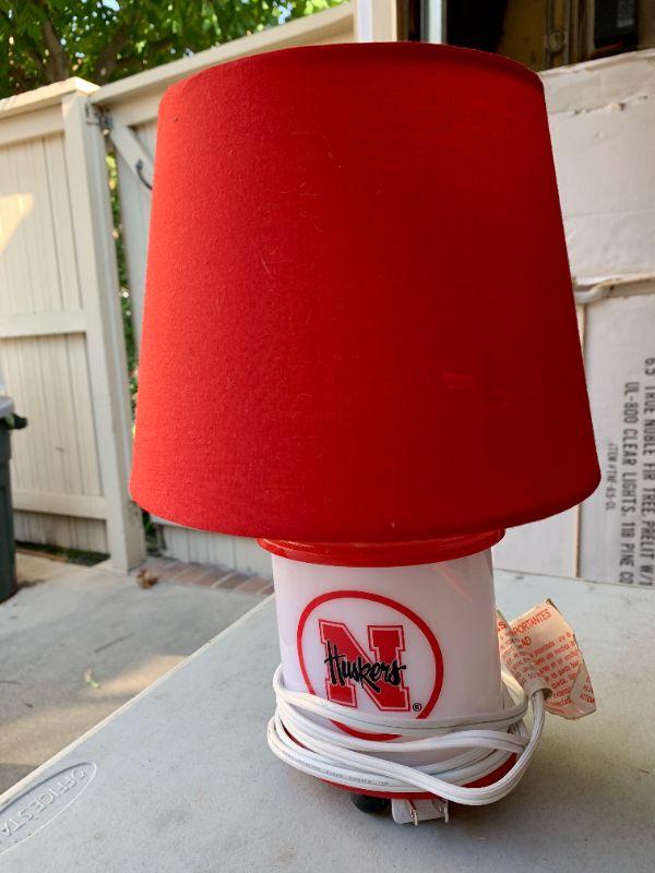 LOT 312 NEBRASKA HUSKERS TABLE LAMP | EstateSales.org