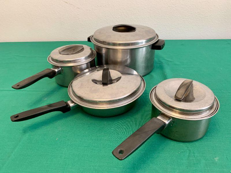 LOT 56 GROUP OF VINTAGE STAINLESS STEEL COOKWARE | EstateSales.org