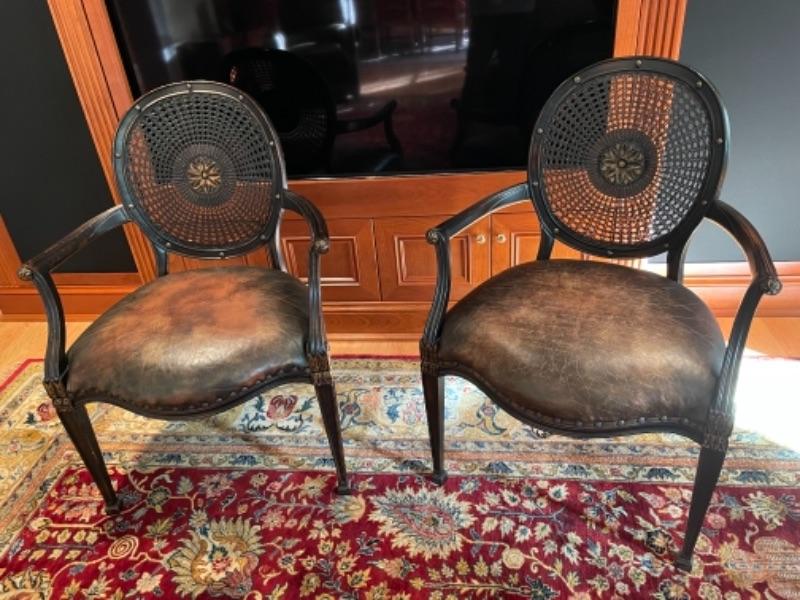 Two leather Councill chairs | EstateSales.org
