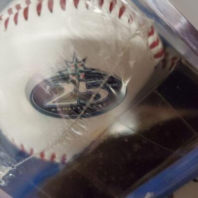 Lot 39: 2002 Sseattle Mariners 25th Anniversary Baseballs | EstateSales.org