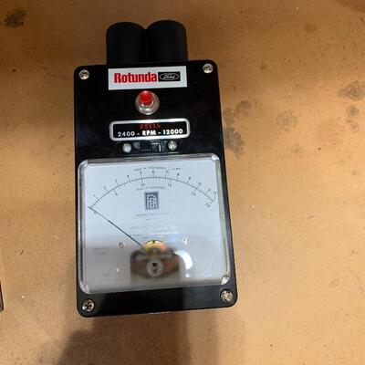 Lot 262 - Ford Rotunda Tachometer and Impact Wrench | EstateSales.org