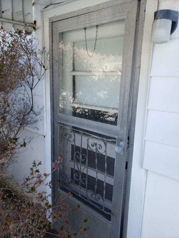 Vintage metal screen door | EstateSales.org