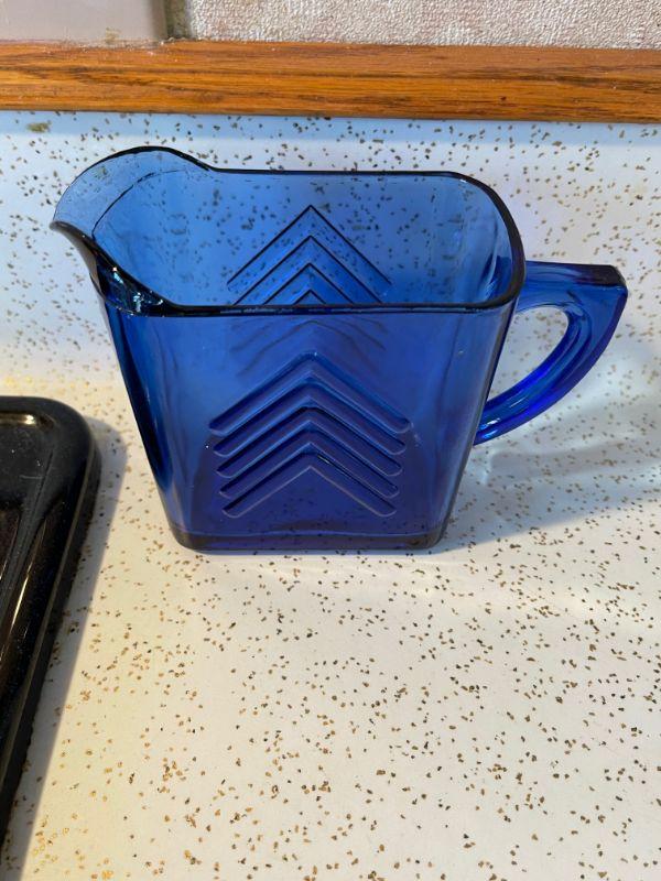 Cobalt blue syrup dispenser | EstateSales.org