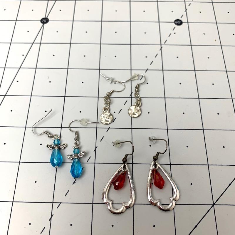 #69 Earrings: Angel/Red/Silver | EstateSales.org