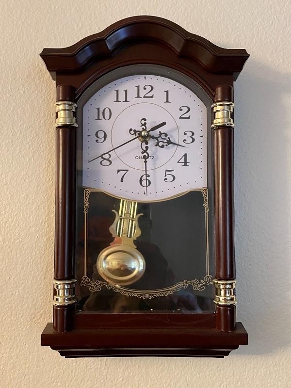 Petite dark wood grand daddy clock | EstateSales.org