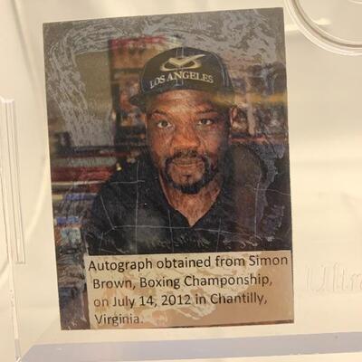 Autographed Simon Brown Boxing Glove | EstateSales.org