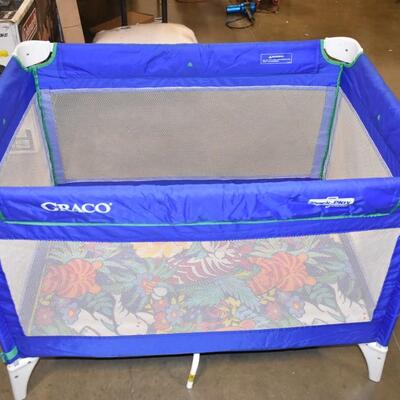 Graco Pack & Play: Blue with Jungle Print | EstateSales.org