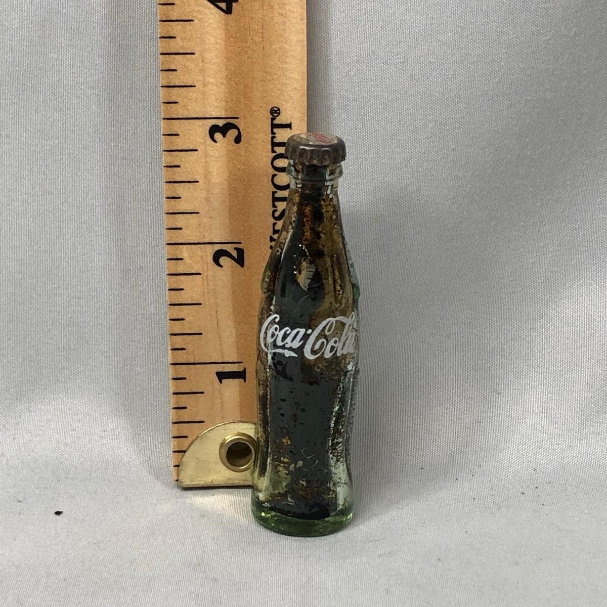 Lot 108 - Miniature Coca Cola Syrup Sample Bottle | EstateSales.org