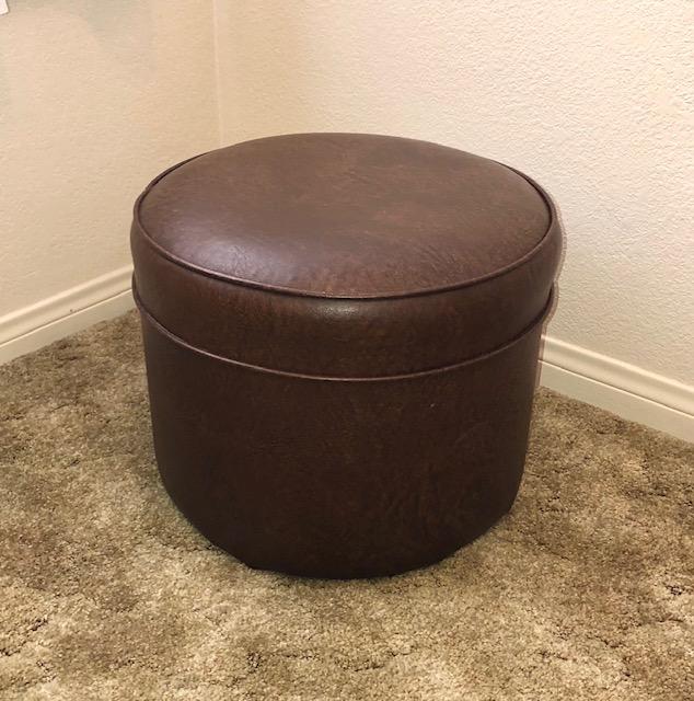 Lot 125 Round Footstool Brown Naugahyde 13" tall | EstateSales.org