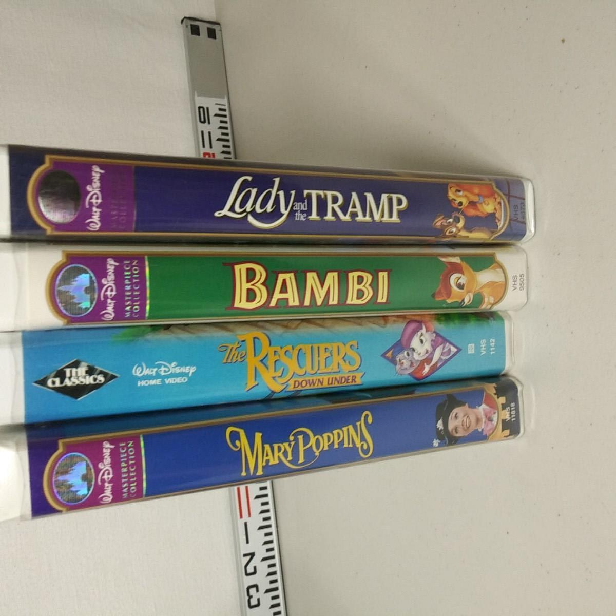 #644 Disney Clam Shell Movies | EstateSales.org