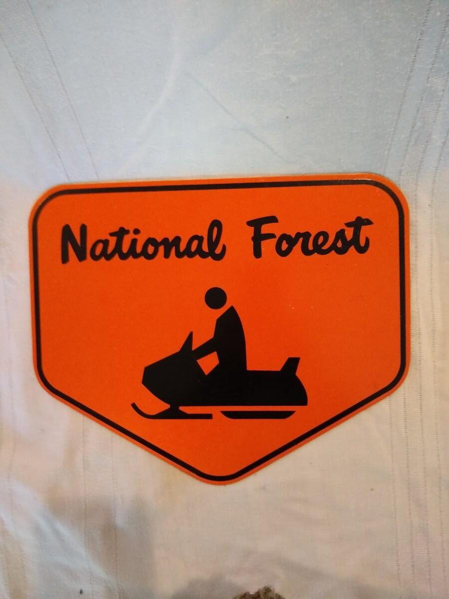 Vintage National Forest Metal Sign with Snow Mobile | EstateSales.org