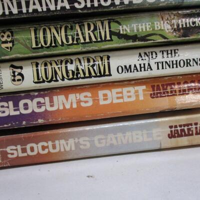 Jake Logan & Tabor Evans Books | EstateSales.org