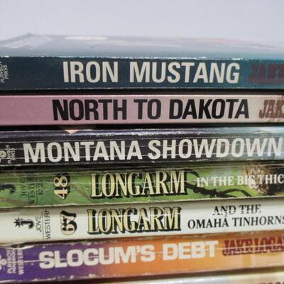 Jake Logan & Tabor Evans Books | EstateSales.org