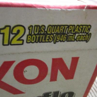 12 Bottles Of Exxon Superflo 5W-30 | EstateSales.org