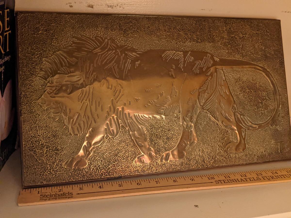 Hammered Copper Lion Plaque | EstateSales.org