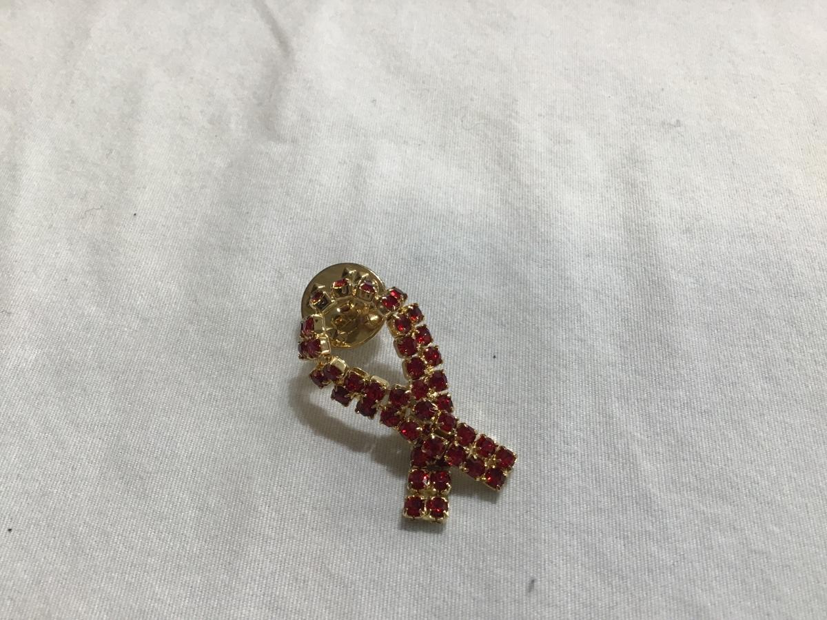 Red Ribbon pin | EstateSales.org