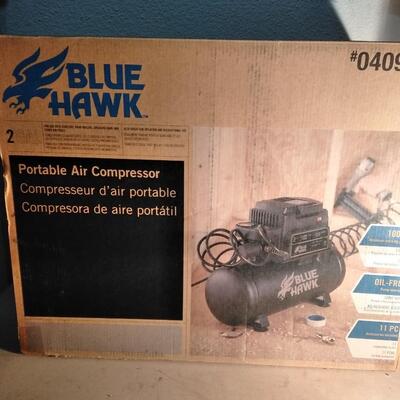 LOT 23 NEW BLUE HAWK PORTABLE AIR COMPRESSOR | EstateSales.org