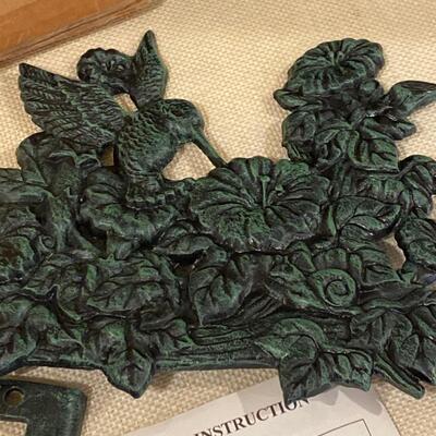 Cast Iron Hummingbird Hose Caddy | EstateSales.org