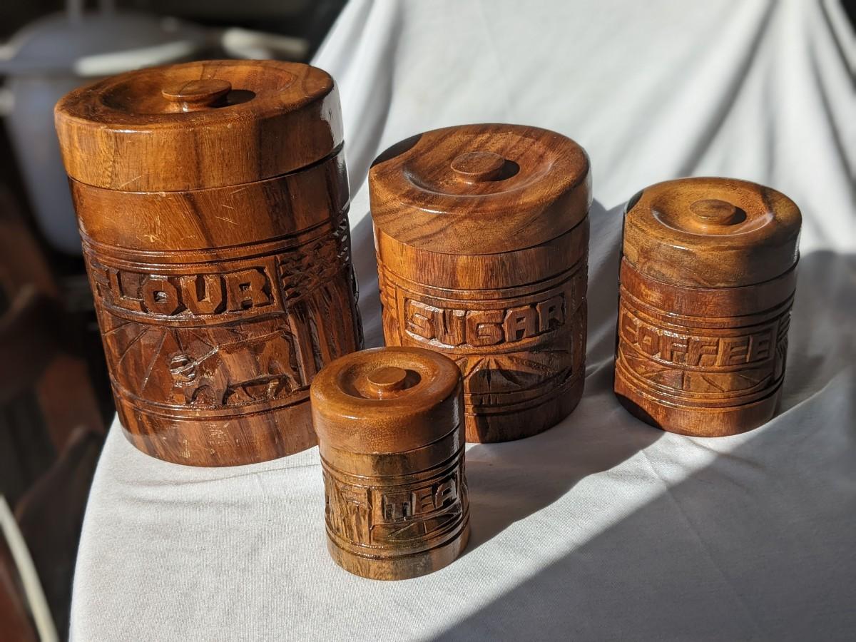MCM Hand carved Vintage Tiki Teak Kitchen Canisters | EstateSales.org