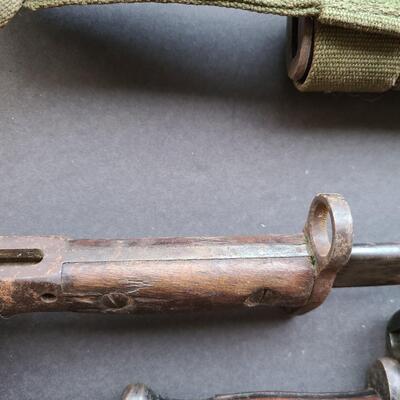 LOT 57: Gas Mask & Bayonets | EstateSales.org