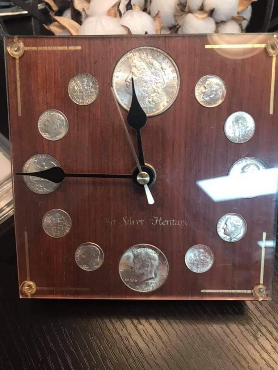 Silver coin clock | EstateSales.org