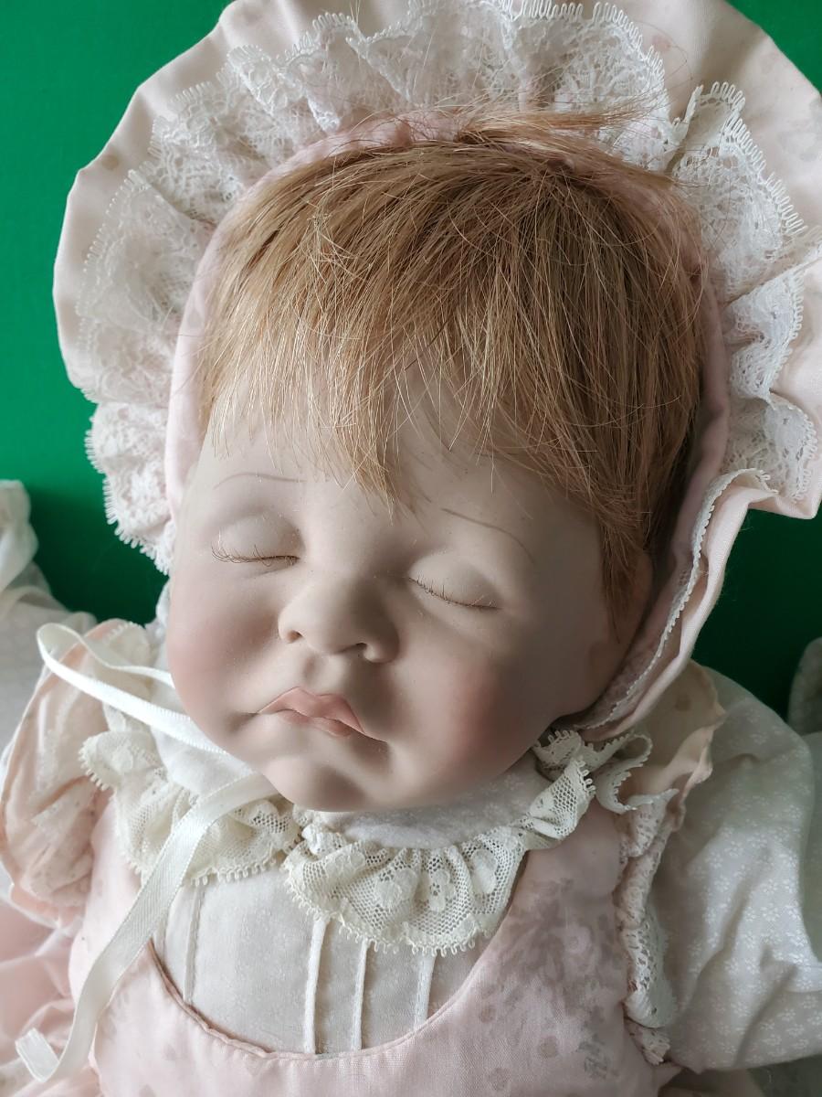 Baby Lying Down doll | EstateSales.org
