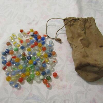 Collection of Marbles with Draw String Bag | EstateSales.org