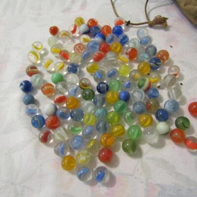 Collection of Marbles with Draw String Bag | EstateSales.org