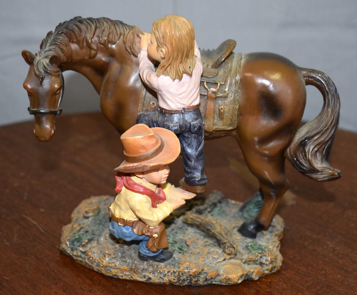 Horse and boy/girl statue | EstateSales.org