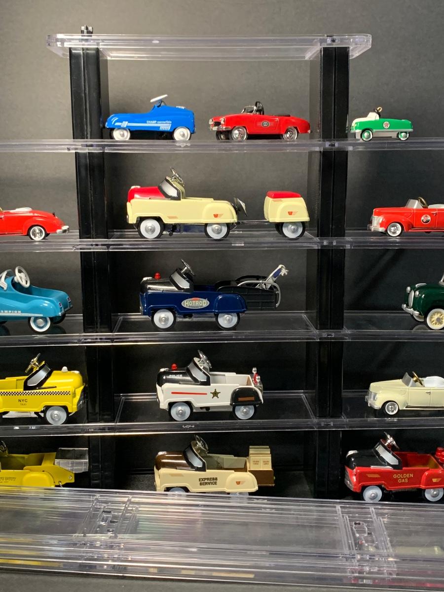 LOT 39: Peddle Car Replica Cars with Display Stand | EstateSales.org