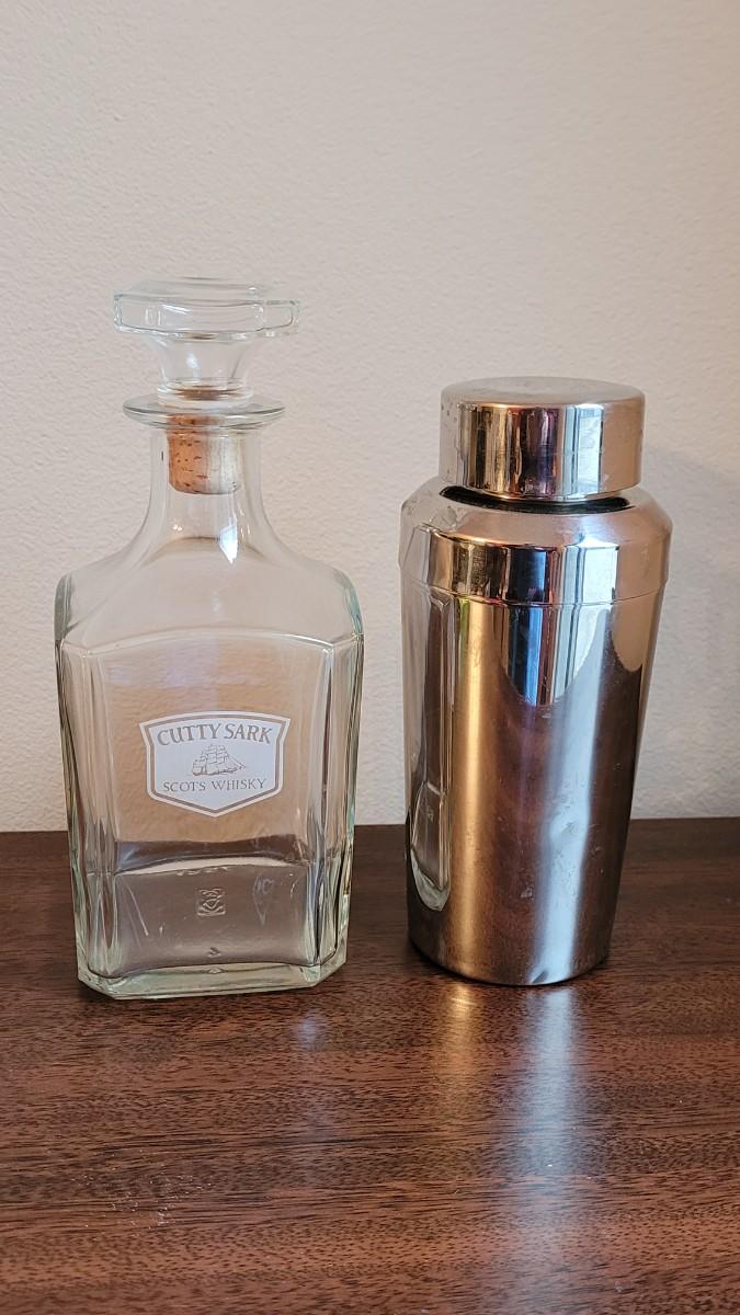 Lot 24: Vintage Cutty Sark Glass Decanter and Italian Stainless Shaker ...