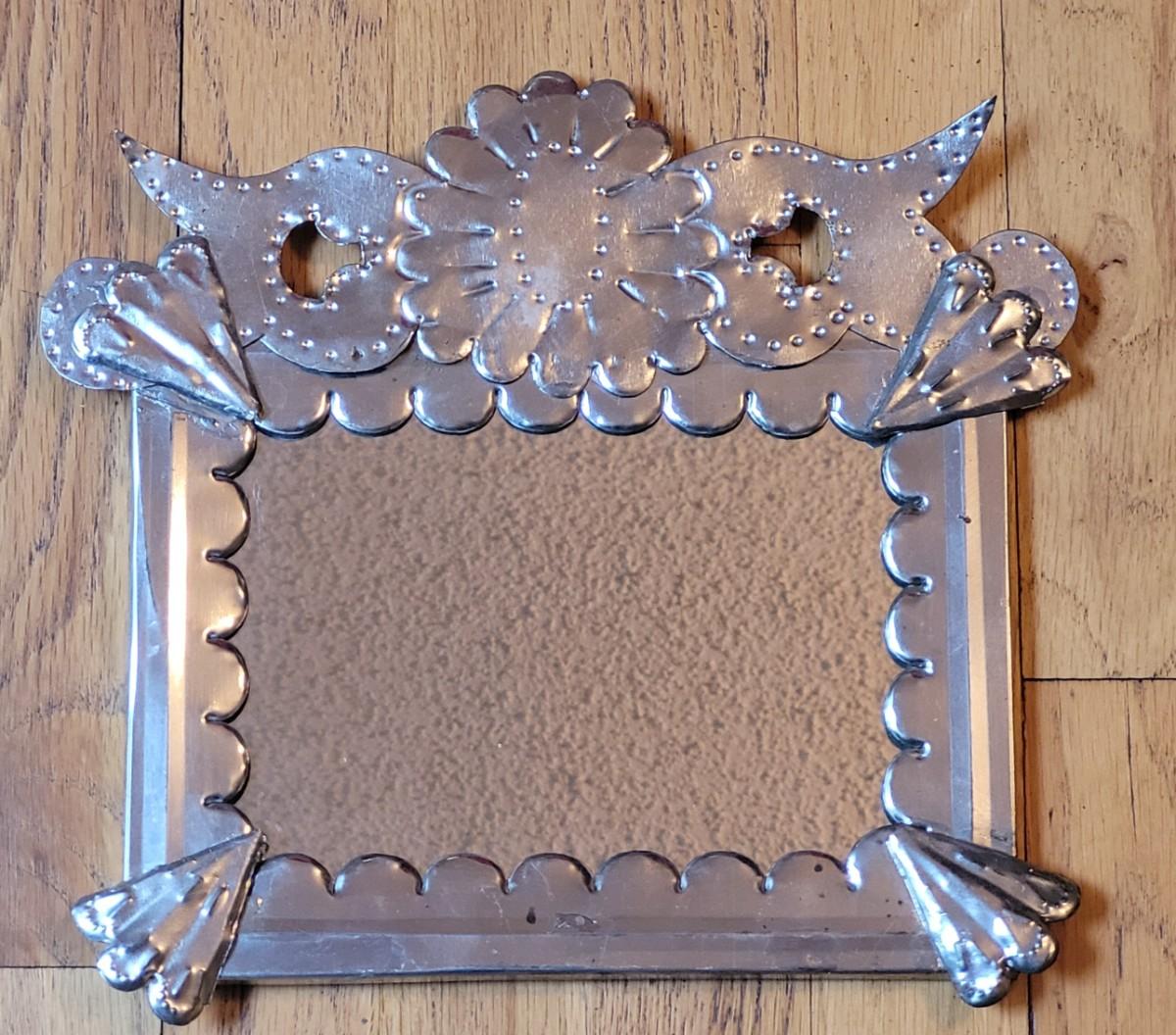 Lot 82: Vintage Mexican Folk Art Punched Tin Mirror | EstateSales.org
