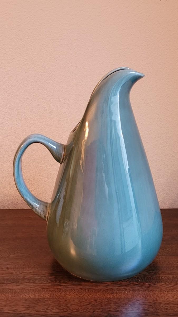 Lot 142: Russell Wright Blue Pitcher | EstateSales.org