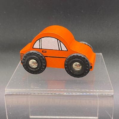 Miniature Orange Wood Block Car with Plastic Wheels | EstateSales.org