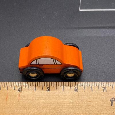 Miniature Orange Wood Block Car with Plastic Wheels | EstateSales.org