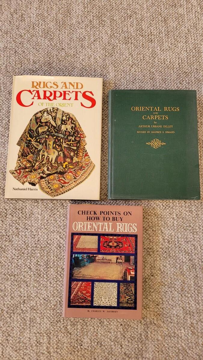 Lot 69: Books on Rugs | EstateSales.org