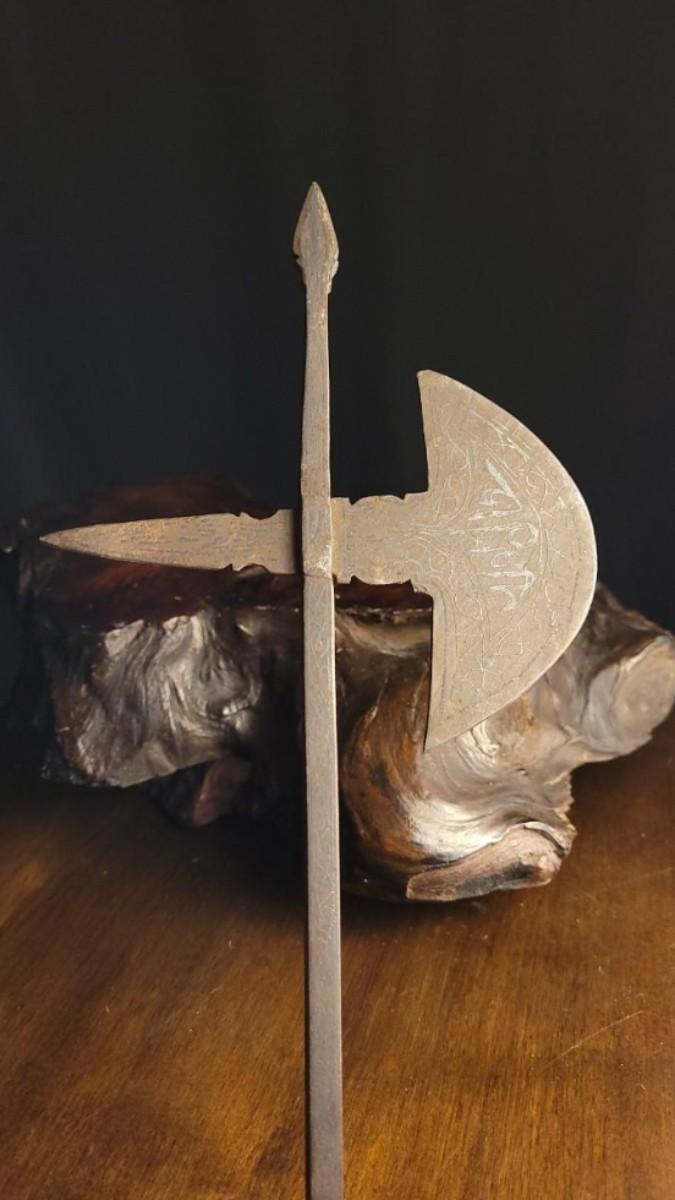 Lot 126:Middle Eastern All-Metal Axe with Chased Axe Head | EstateSales.org