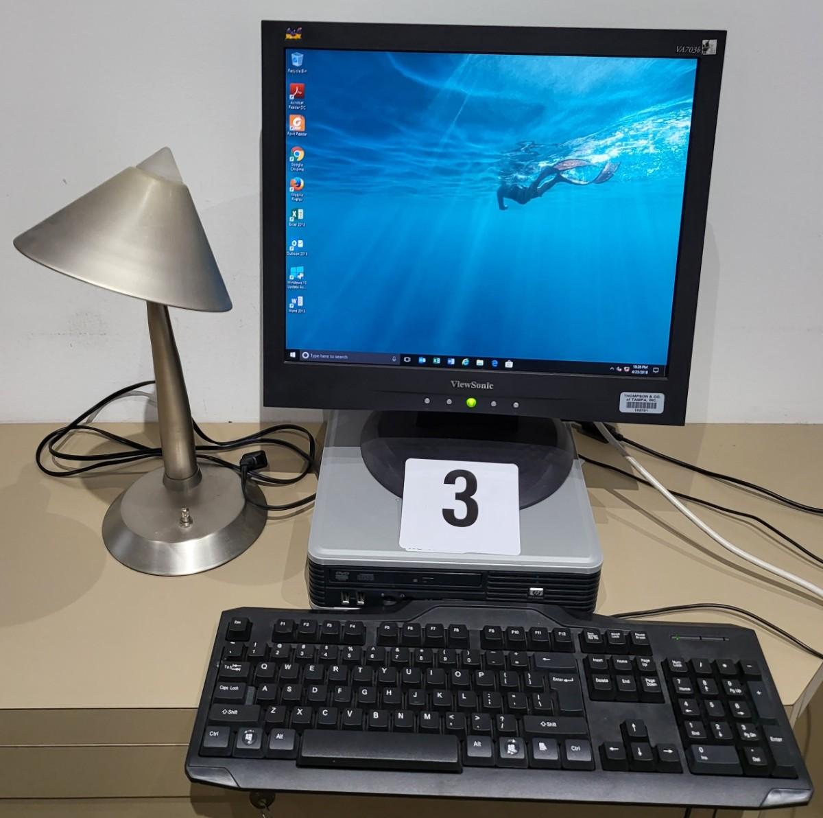 HP Compaq Computer and Desk Lamp Lot | EstateSales.org