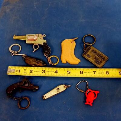 LOT 38 SEVEN OLD KEY CHAINS | EstateSales.org