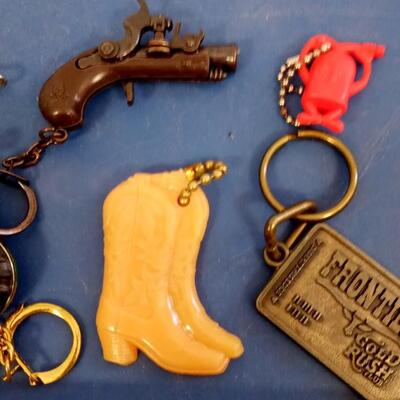 LOT 38 SEVEN OLD KEY CHAINS | EstateSales.org