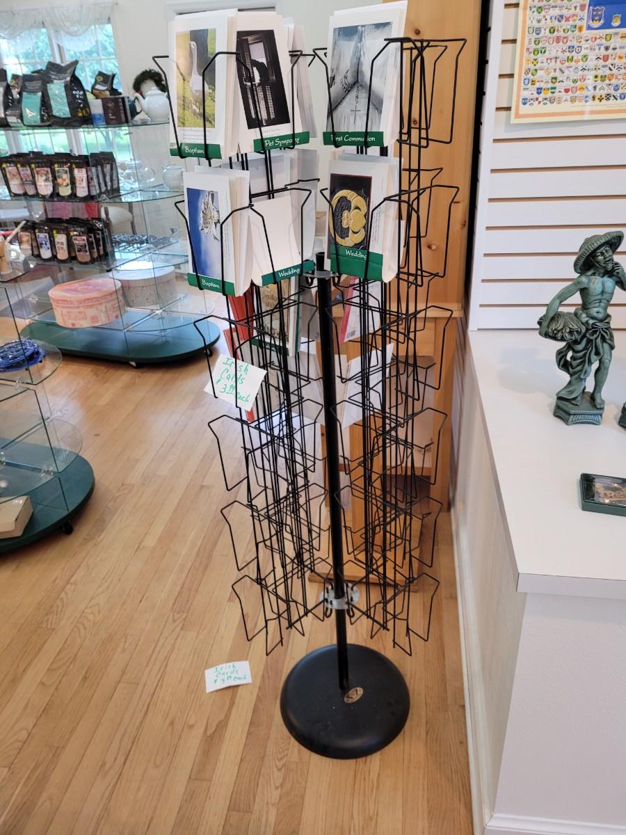 Black Spinning Card Rack | EstateSales.org