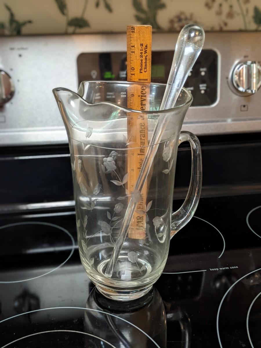 Beautiful Etched Glass Pitcher and Stirrer | EstateSales.org