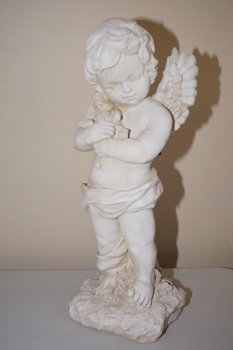GARDEN ANGEL HOLDING RABBIT RESIN STYLE FIGURINE | EstateSales.org