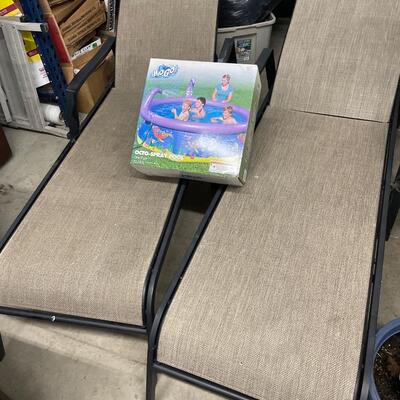 F24-Lounging lawn chairs and Octo spray pool | EstateSales.org