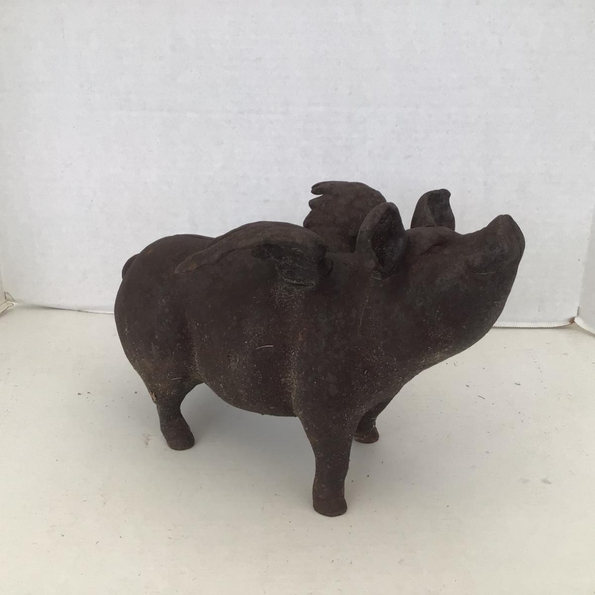 5365 Cast Iron Flying Pig Yard Ornament | EstateSales.org