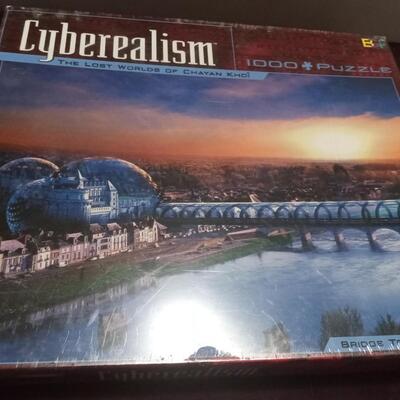 LOT 140 SEALED 1000 JIG SAW PUZZLE "CYBEREALISM" | EstateSales.org