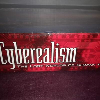 LOT 140 SEALED 1000 JIG SAW PUZZLE "CYBEREALISM" | EstateSales.org