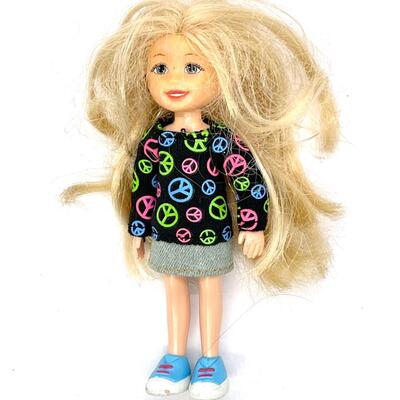 Barbie doll with peace sign dress kids toy | EstateSales.org