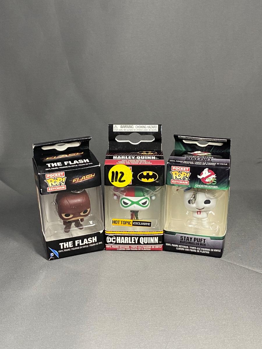 LOT 112: 3 POCKET POP KEYCHAINS | EstateSales.org