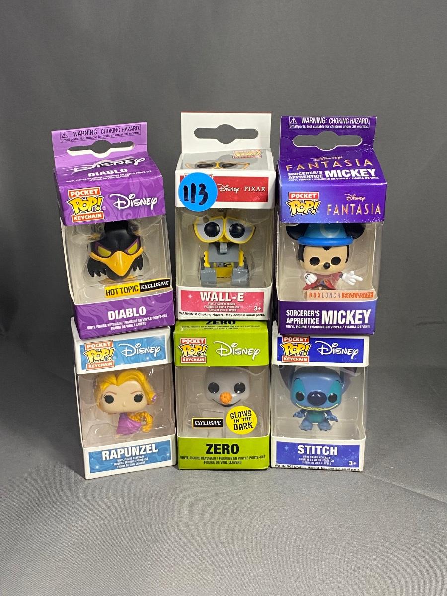 LOT 113: DISNEY SET POCKET POP KEYCHAINS | EstateSales.org